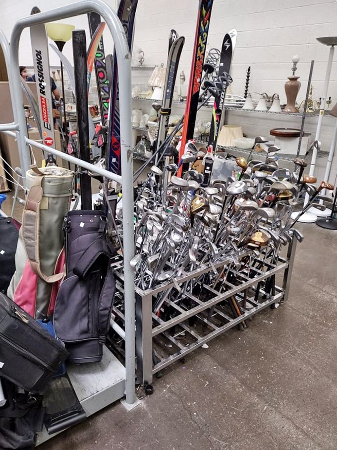 Golf clubs and skis living together in perfect harmony. The sports equipment section is where seasonal hobbies go to find their second wind.
