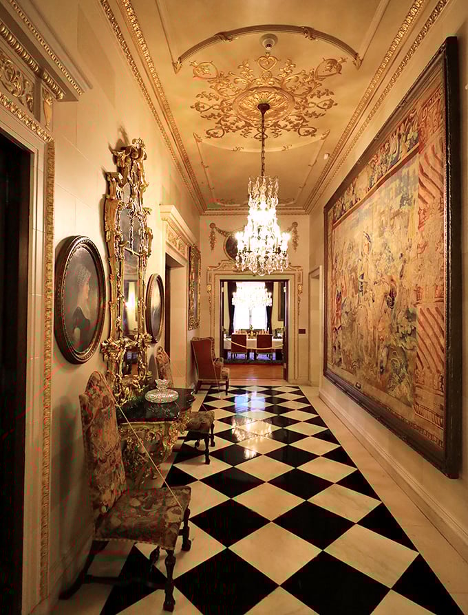 A hallway where even your shadow feels underdressed. That checkerboard floor has witnessed more history than most history books.