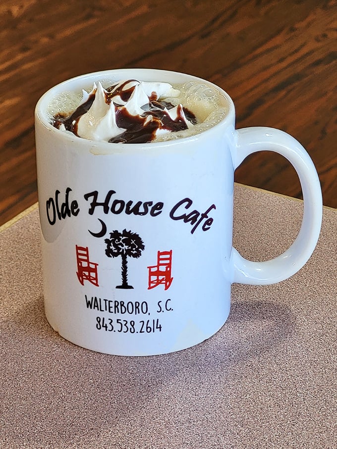 Their signature mug filled with hot chocolate and whipped cream – like drinking dessert while advertising your excellent taste in restaurants.