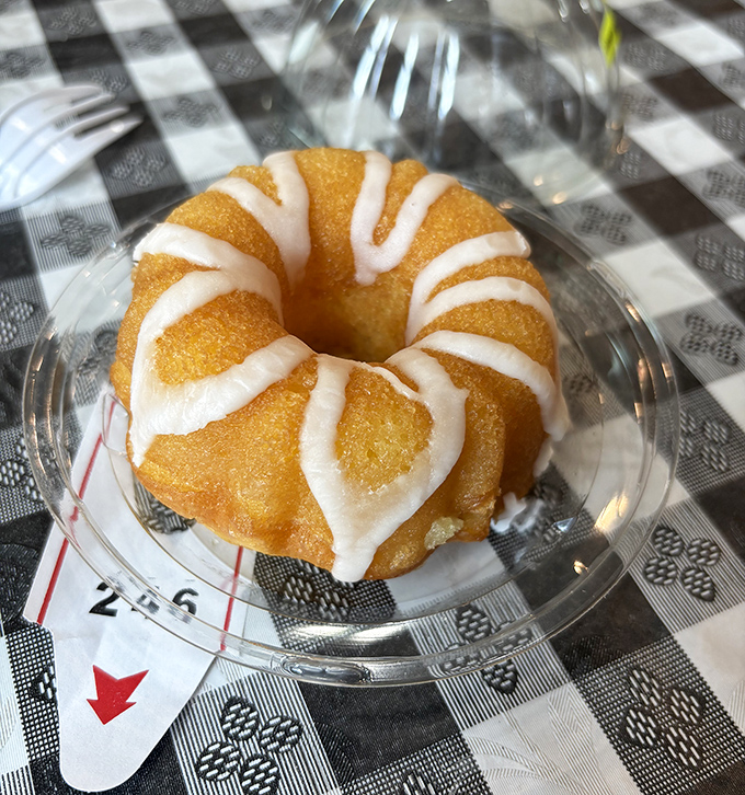 This rum cake wears its glaze like a Sunday dress – sweet, elegant, and absolutely irresistible.