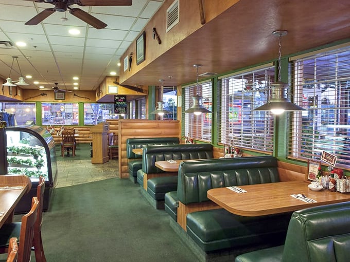 Green booths and wooden tables create the perfect backdrop for breakfast drama – where the only conflict is deciding between sweet or savory.