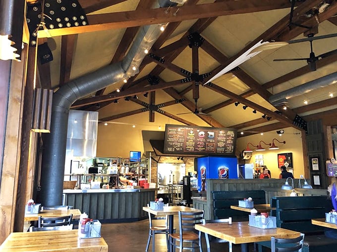 Exposed beams and warm lighting create the perfect backdrop for the serious business of barbecue appreciation.