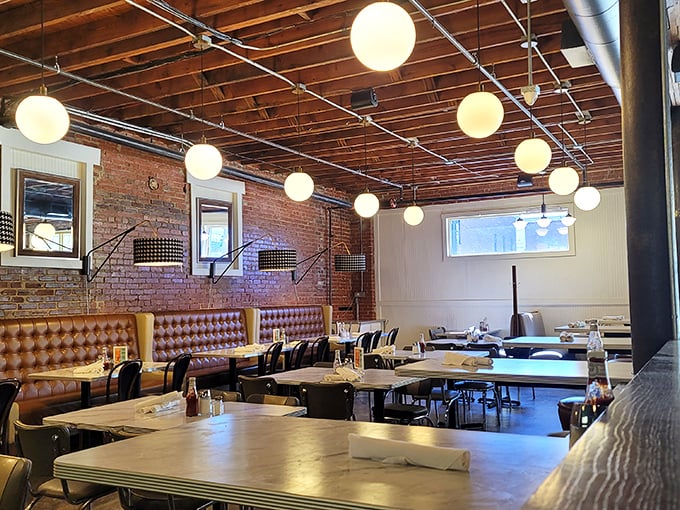 The dining room feels like your coolest friend's loft apartment—if that friend happened to be an exceptional short-order cook.