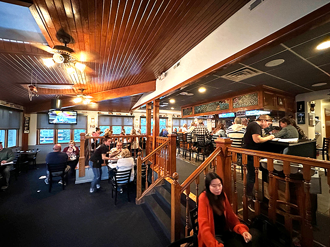 The split-level dining room offers that rare combination of spaciousness and coziness, like your favorite aunt's house—if she could cook for 50.