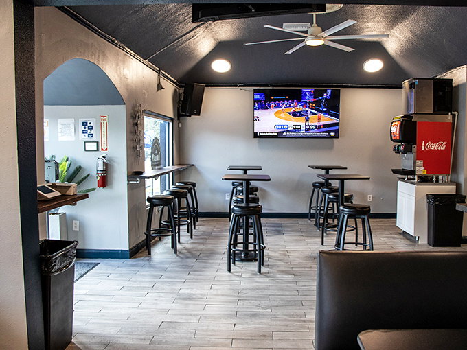 Clean lines, high-top tables, and screens for the game—this space knows exactly what a neighborhood bar should look like.