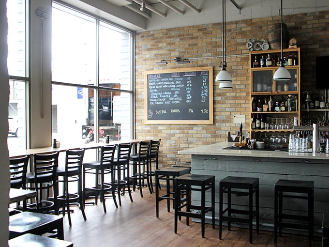 The bar area—where strangers become friends over oyster debates and where "just one more" is the evening's most repeated phrase.