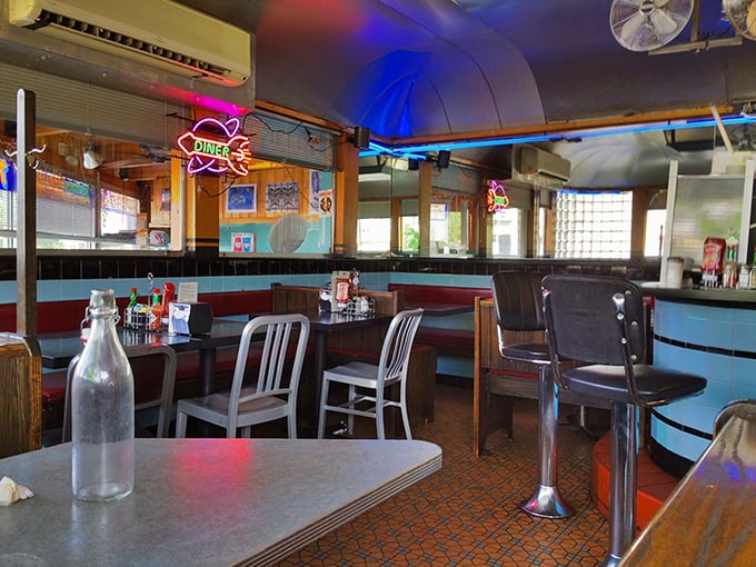 The interior's chrome ceiling reflects decades of satisfied breakfast faces and coffee steam dreams.