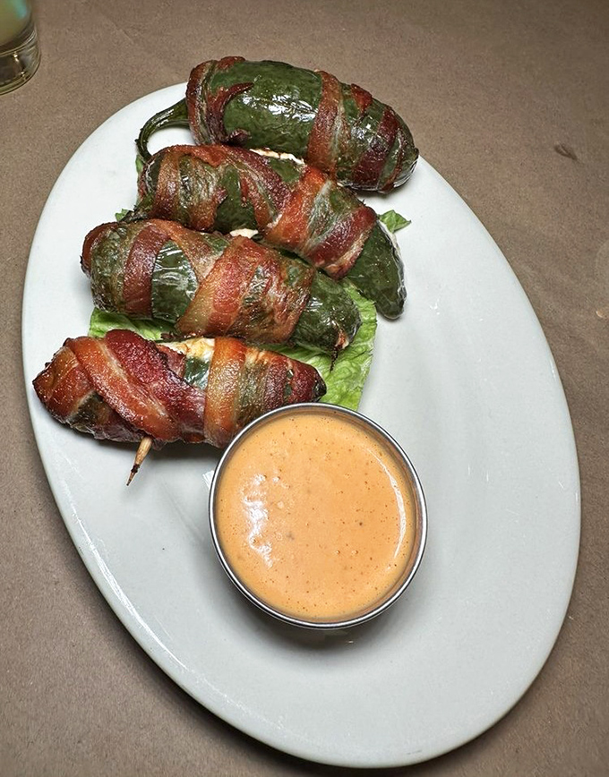 Jalapeños wrapped in bacon—proof that sometimes the simplest combinations create the most profound happiness. Spicy, smoky, and utterly addictive.
