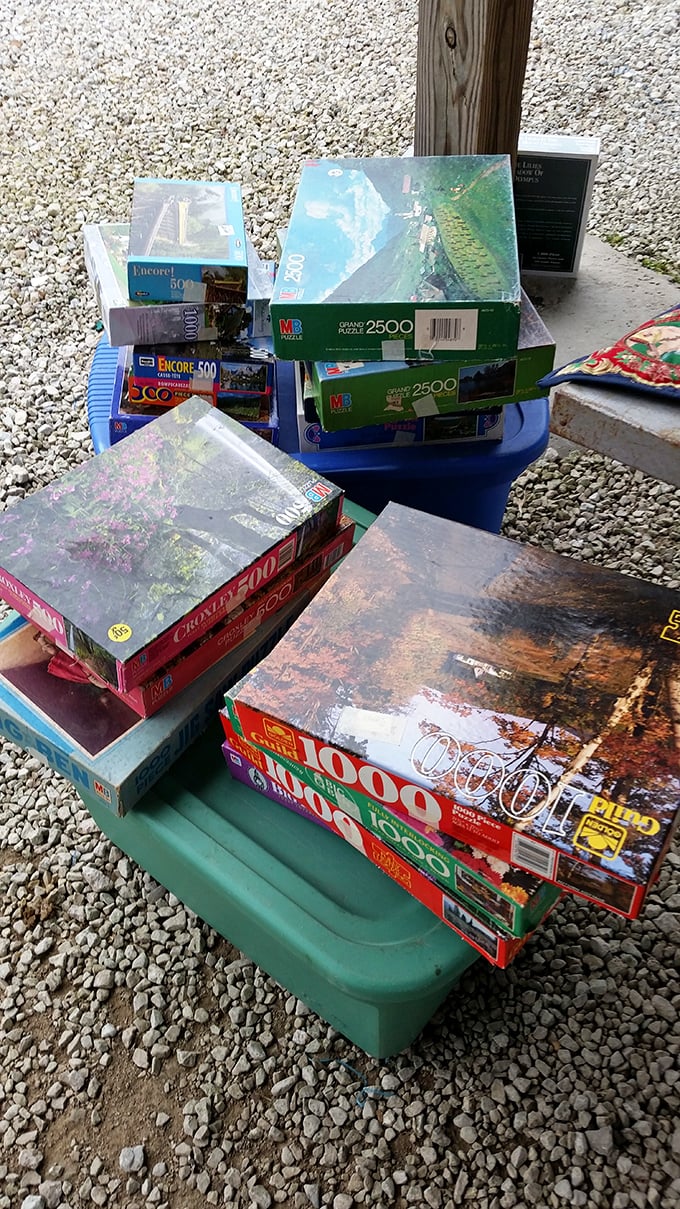 Stacked jigsaw puzzles waiting to provide hundreds of hours of entertainment, one interlocking piece at a time.