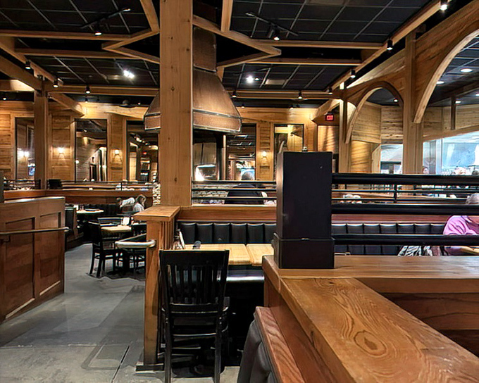 The dining room balances rustic charm with modern comfort, like your favorite flannel shirt that somehow works for both hiking and dinner dates.