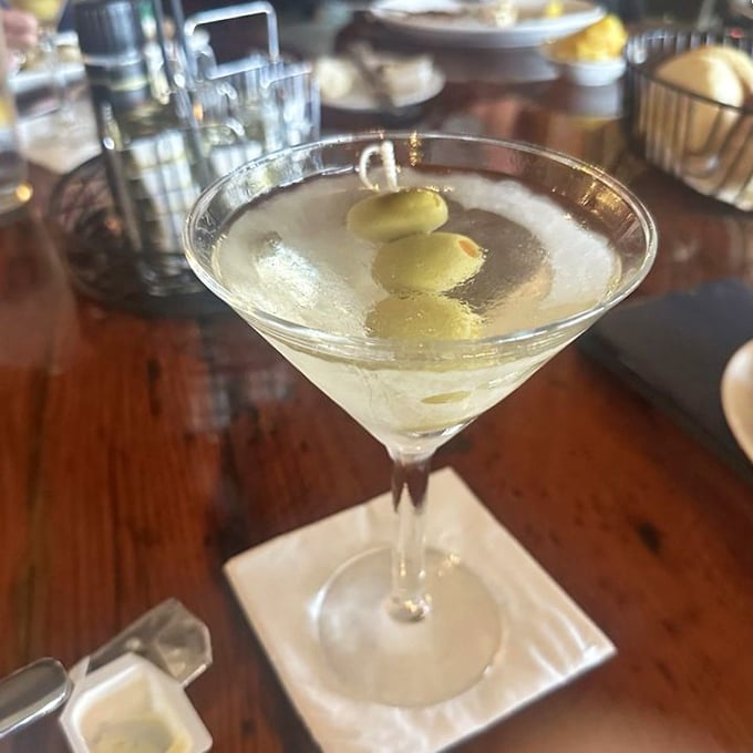 Three olives in a crystal-clear martini—the liquid equivalent of a power suit that says, "I've arrived, and I have excellent taste."