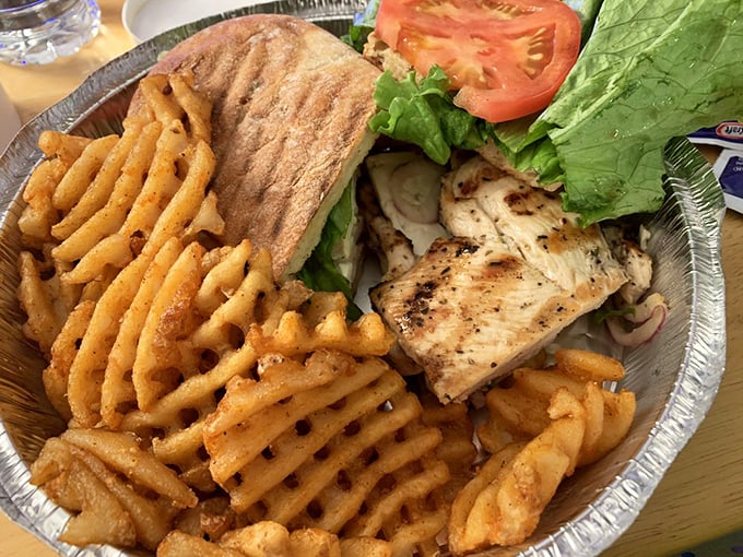 This Mediterranean chicken sandwich with waffle fries proves that diners excel beyond breakfast – a lunch worthy of your precious midday appetite.