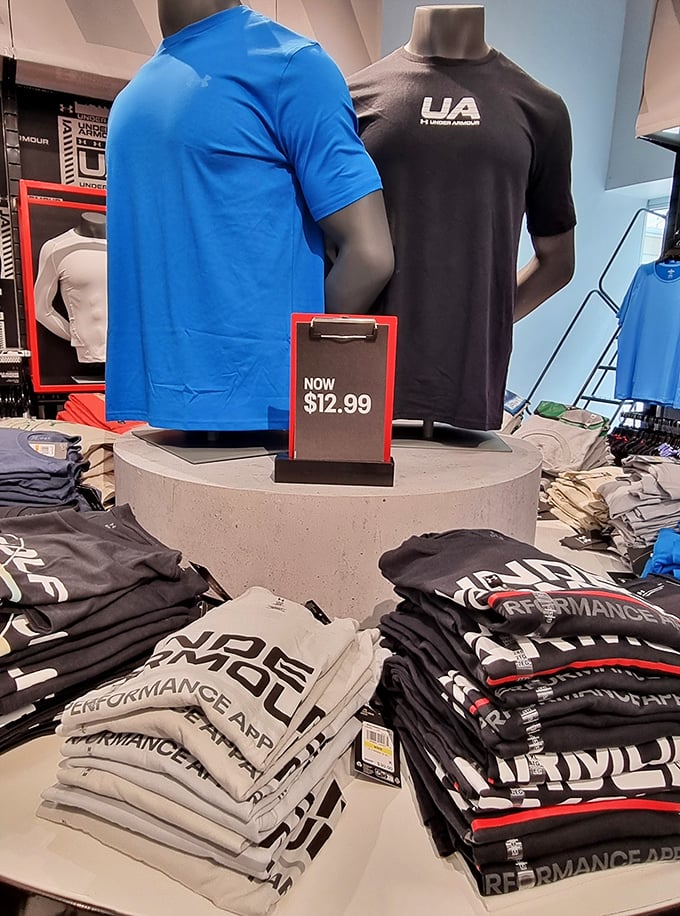 Under Armour's display proves performance wear doesn't require performing financial gymnastics. At $12.99, these shirts cost less than most Maryland crab lunches.
