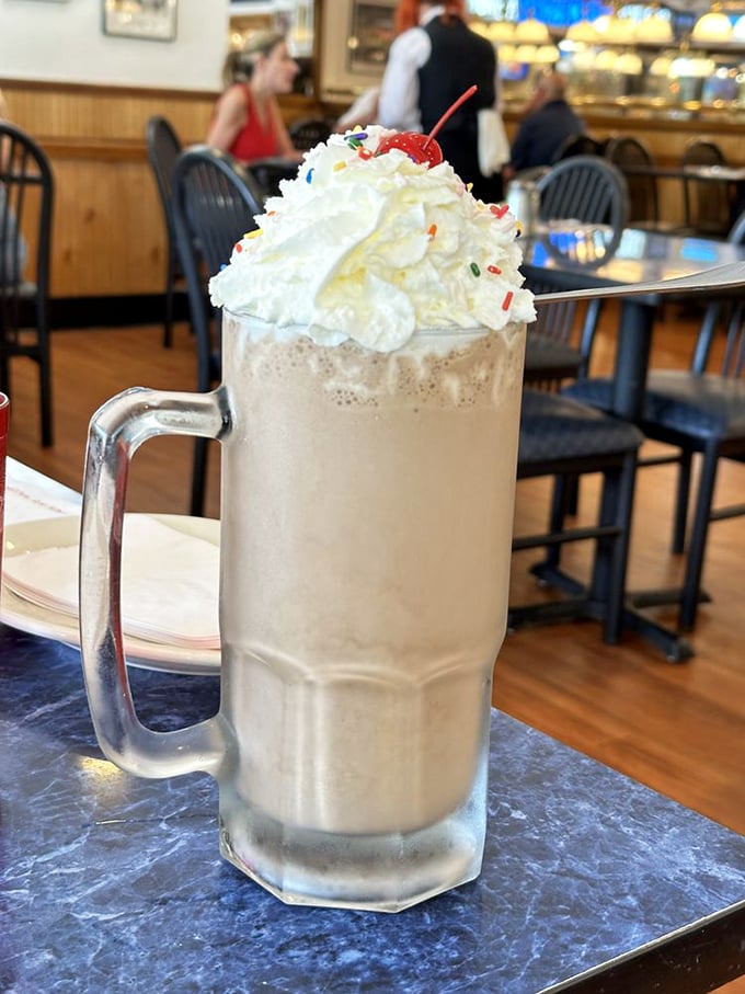 This milkshake doesn't just bring boys to the yard – it brings everyone to Harold's for a tower of creamy nostalgia topped with whipped dreams.