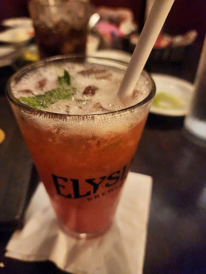 This isn't just a mojito – it's summer in a glass, with mint leaves doing synchronized swimming in refreshing citrus waters.