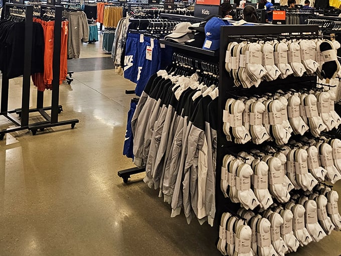 The sock wall at Nike – where your feet can finally dress better than you do, and no one will judge your cartoon character choices.