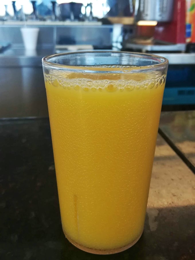 Fresh-squeezed orange juice so bright and cheerful it's like sunshine in a glass – the perfect companion to any breakfast adventure.