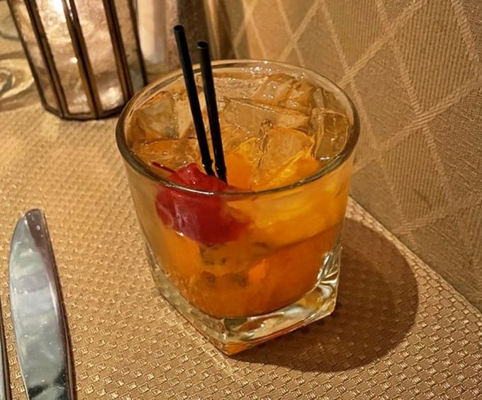 An Old Fashioned that looks like liquid amber in crystal—the kind of cocktail that makes you want to discuss jazz or complain about modern architecture.