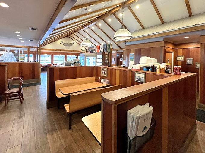 Wooden booths and warm lighting create the perfect backdrop for breakfast conversations that stretch into lunchtime.