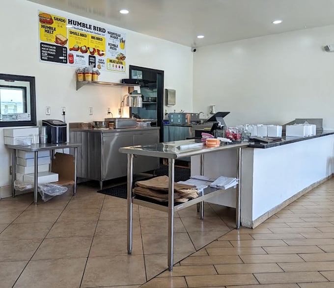 Clean lines, efficient setup, and a kitchen ready to deliver flavor bombs. This isn't just a restaurant—it's a well-oiled chicken-frying machine.