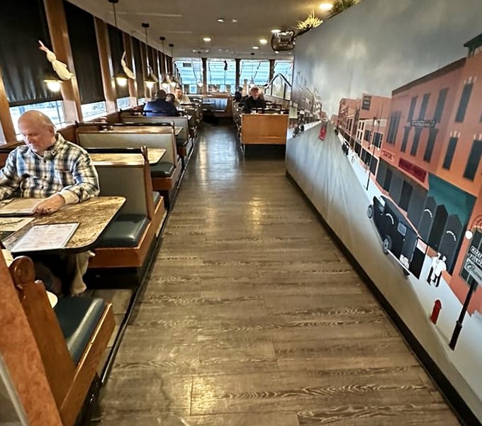 Booth seating and warm lighting create the perfect backdrop for leisurely meals and meaningful morning conversations.