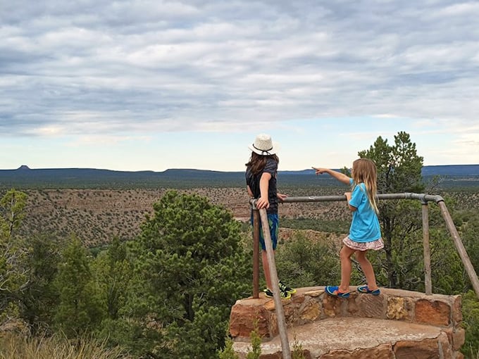 Two explorers taking in the vast New Mexico landscape—proof that the best viewpoints rarely come with guardrails or gift shops.