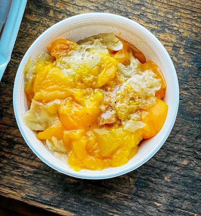 This peach cobbler isn't just dessert—it's Southern sunshine in a bowl. The perfect marriage of fruit and buttery crust that makes time stand still.
