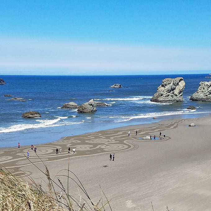 Nature's art gallery unfolds at Bandon's beaches, where sea stacks rise dramatically and visitors create ephemeral sand designs that disappear with the tide.