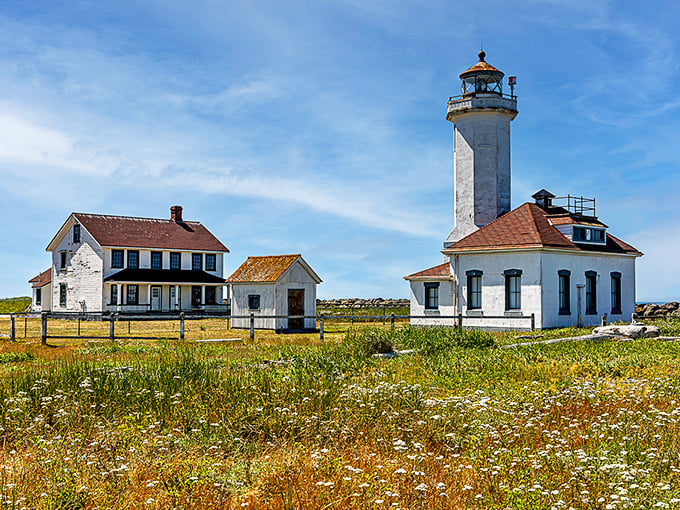 Point Wilson Lighthouse stands sentinel at the meeting of Admiralty Inlet and the Strait of Juan de Fuca, its whitewashed tower a reassuring landmark for generations of mariners.