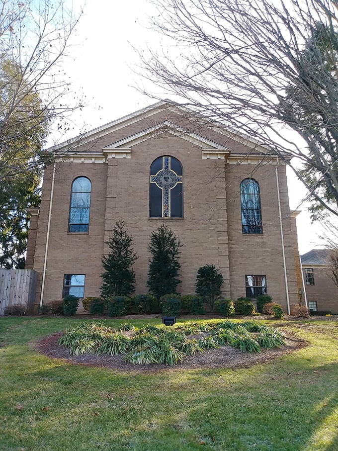 Precious Blood Catholic Church's stained glass catches the light like jewels – architectural proof that faith and beauty often share the same address.
