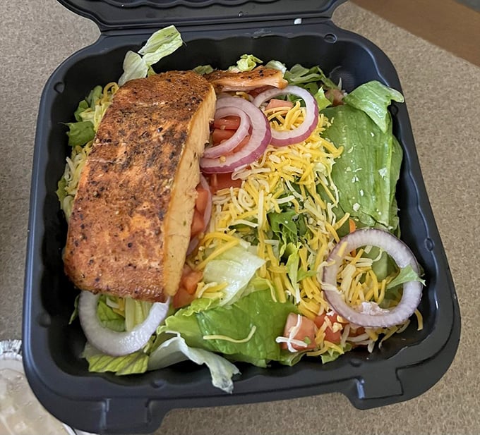 Even salads get the smoke treatment here. That salmon didn't just swim upstream—it ascended to flavor heaven.