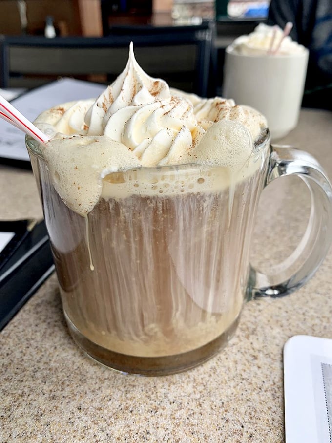 Even the hot drinks get the royal treatment. This isn't just coffee – it's dessert with caffeine, topped with a cloud of whipped cream.