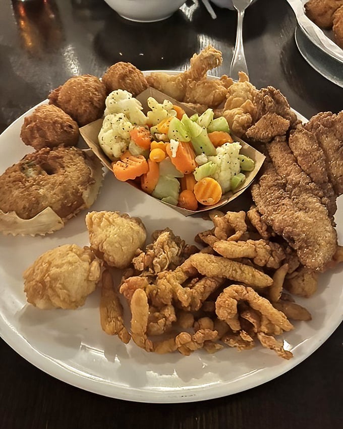 The seafood platter that answers the eternal question: "Why choose one when you can have it all?" Fried bounty from both land and sea.