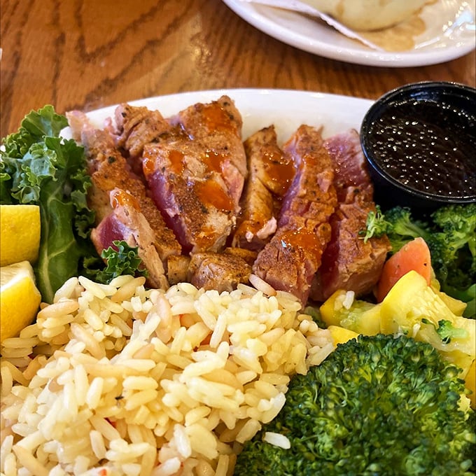 Seared ahi that proves inland restaurants can nail seafood too. That perfect pink center surrounded by seasoned crust is a beautiful contradiction.