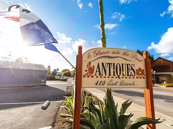 The sign says it all—a glance that becomes a lingering gaze into California's past. Your treasure hunt begins at this wooden marker.