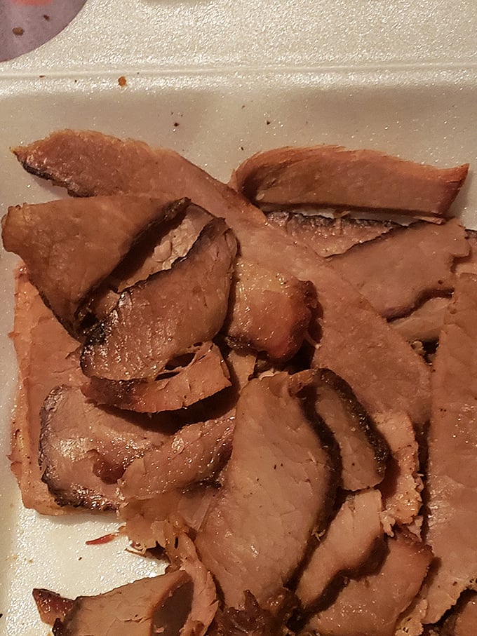 Sliced brisket with that telltale pink smoke ring—proof that while Memphis is pork country, they respect beef traditions too.