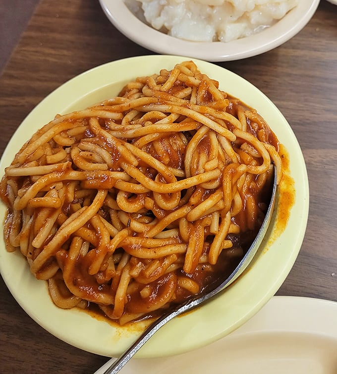 Spaghetti with meat sauce might seem odd at a chicken joint, but in southeastern Kansas, it's tradition on a plate.