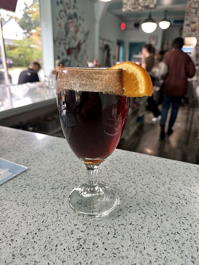 That's not just a drink—it's a goblet of morning courage, rimmed with sugar and garnished with citrus to help you face whatever Monday has planned.
