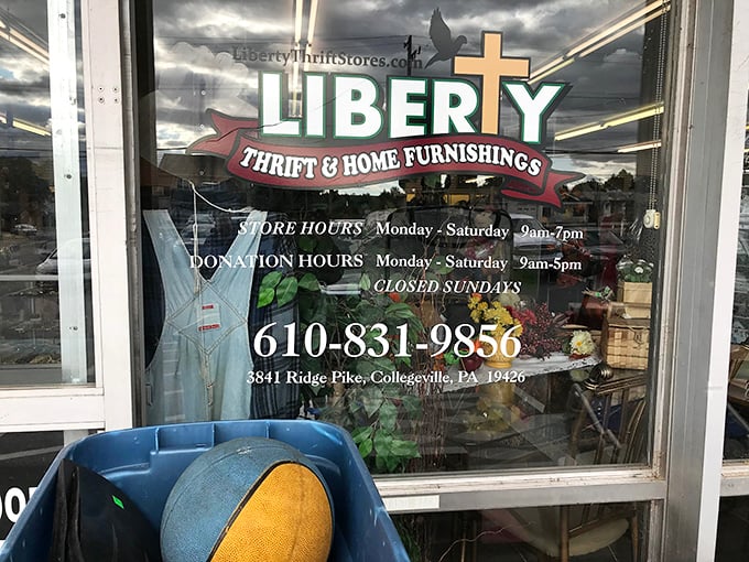 The storefront window reveals not just hours but a mission. Every purchase helps support community programs that change lives.