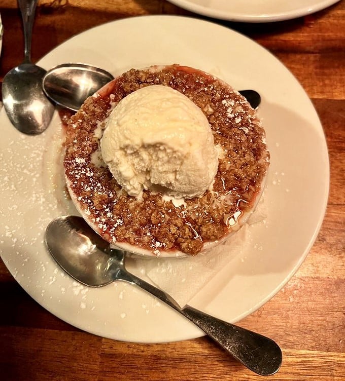 Sweet endings are never an afterthought here. This warm cobbler crowned with melting vanilla ice cream is worth saving room for—though you rarely do.