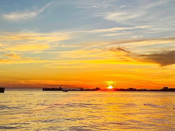 Mother Nature showing off at sunset, painting the sky in shades that would make Monet jealous. Those concrete ships create the perfect silhouette.