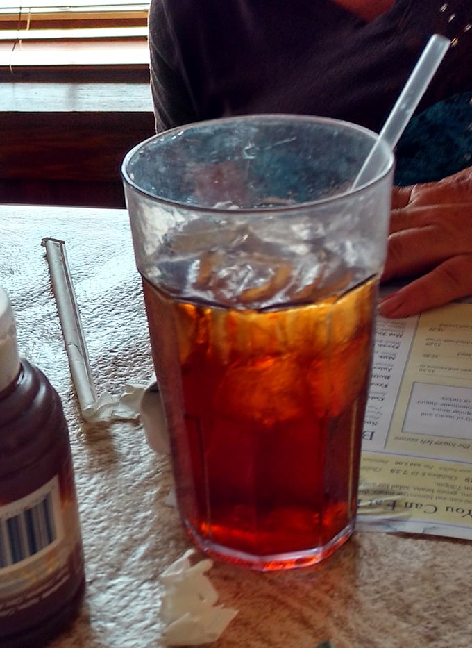 Sweet tea served in a glass big enough to baptize a small child – the unofficial state beverage of "sit a spell and tell me about your day."