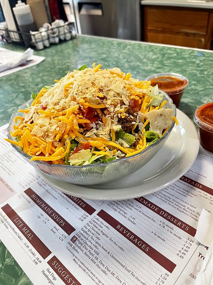 A taco salad that doesn't apologize for its Midwestern interpretation—cheese abundant, crispy shell intact, and absolutely delicious.