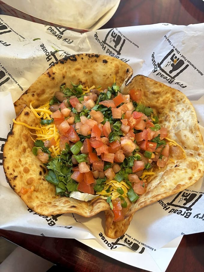 A fry bread taco salad that makes the old Taco Bell version look like a sad, distant relative who wasn't invited to the family reunion.