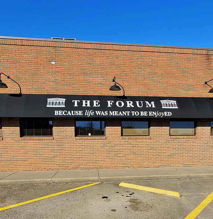 The Forum celebrates life's simple pleasures with its welcoming facade. Their philosophy is right there on the sign—life was indeed meant to be enjoyed.
