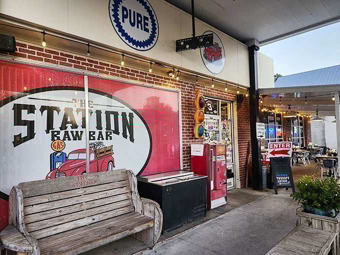 The Station Raw Bar's vintage gas pump and weathered bench say, "We were authentically retro before it was cool to be authentically retro."