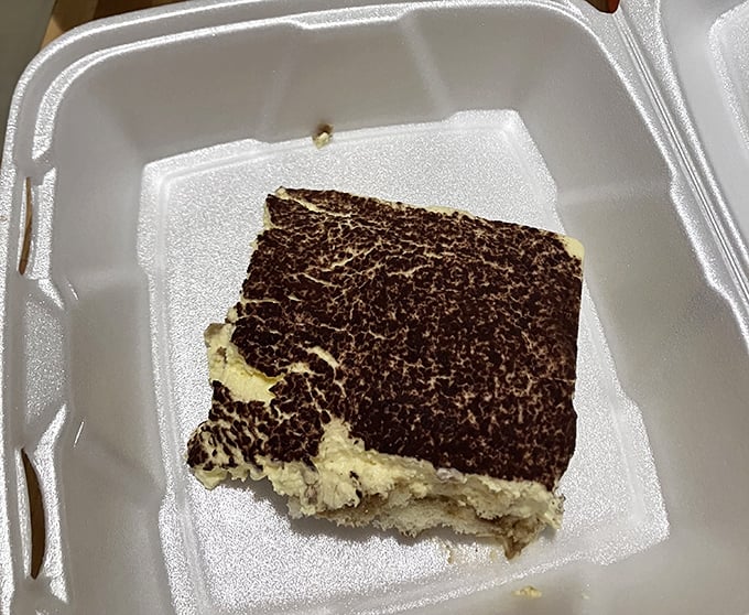 Tiramisu that strikes the perfect balance between coffee-soaked decadence and cloud-like mascarpone – dessert nirvana in a takeout container.