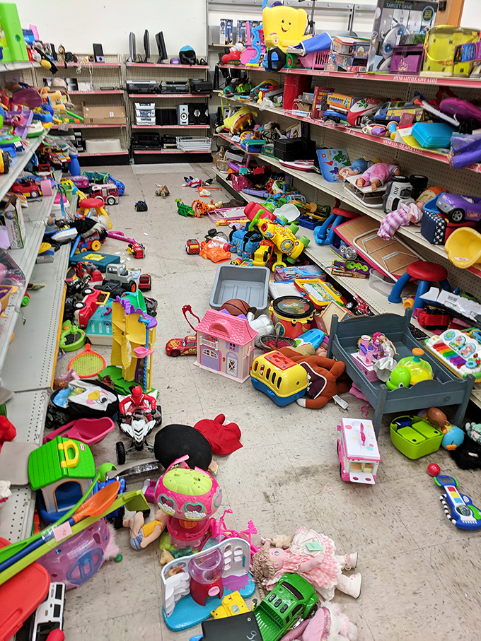 The toy section looks like what happens when a kindergarten class hits a sugar high – chaotic, colorful, and full of plastic possibilities.