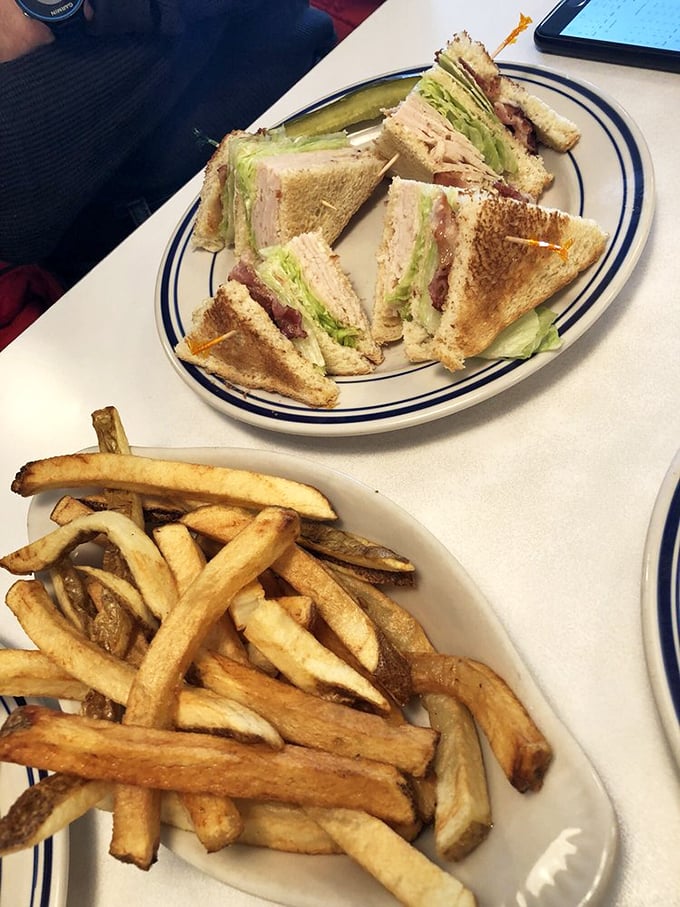The classic club sandwich – architecture you can eat, with layers of goodness held together by those little wooden spears of sandwich solidarity.