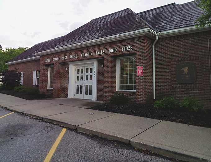 The post office that makes you want to write more letters—classic brick architecture and small-town service that Amazon's algorithm can never replicate.